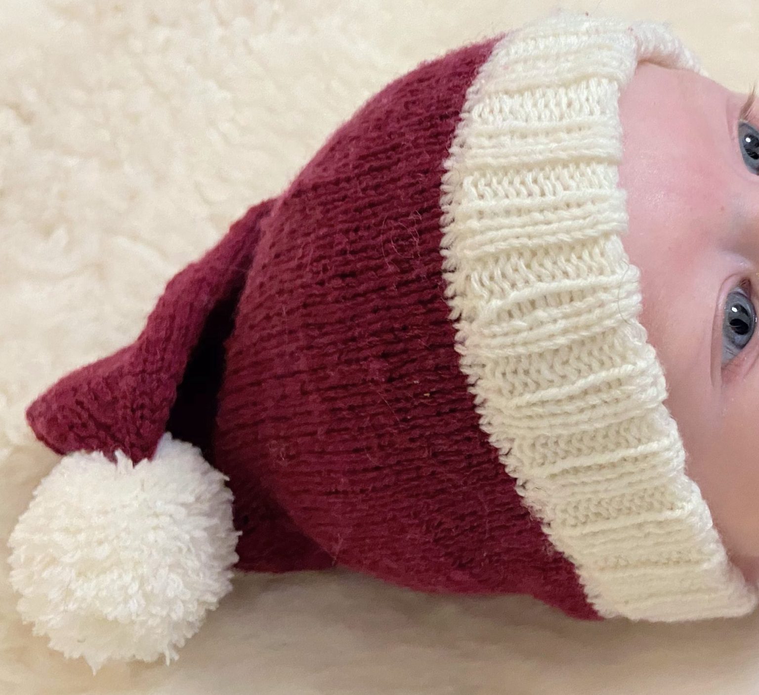 Santa Hat for Babies and Toddlers [FREE Knitting Pattern] - Knitgrammer